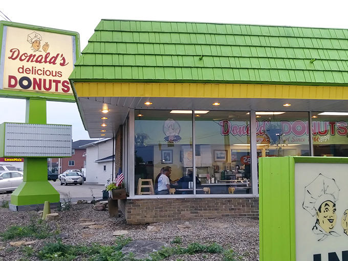That cheerful green exterior hides Ohio's most legendary apple fritters, drawing pilgrims from across America.