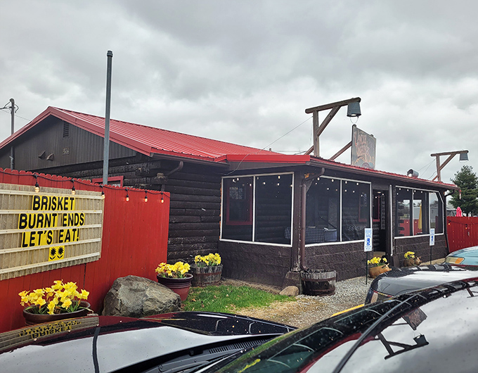 The unassuming exterior of Uncle Beth's BBQ hides culinary treasures within. That little dog might be the unofficial quality control manager!