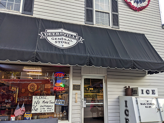 The classic white clapboard exterior with its bold black awning stands as a time capsule in rural Ohio. No fancy marketing needed when the sandwiches speak for themselves.