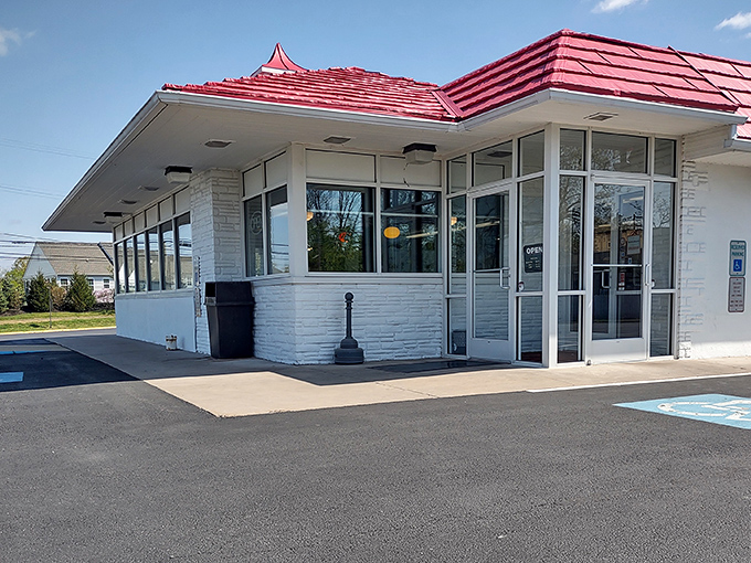 The iconic red roof of Speck's Drive-In stands as a beacon of comfort food in Collegeville, a time capsule of Americana serving deliciousness since before trendy was trendy.