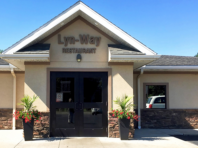 The unassuming exterior of Lyn-Way Restaurant stands like a culinary lighthouse in Ashland, beckoning hungry travelers with the promise of comfort food perfection.