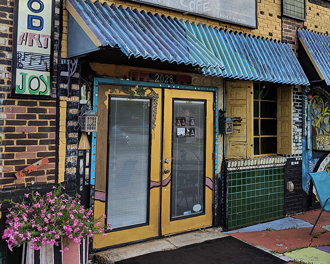The cheerful yellow exterior with blue awning feels like a coastal shack magically transported to Ohio. Seaside charm in the Midwest!