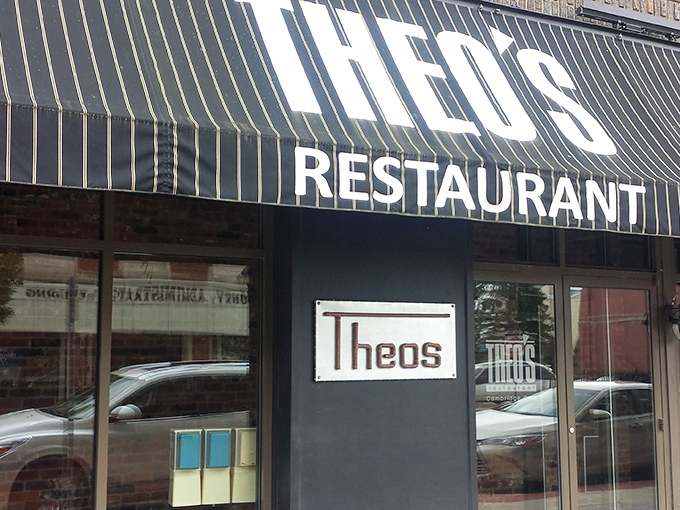 The classic black awning of Theo's Restaurant stands as a beacon of culinary promise in downtown Cambridge, inviting hungry travelers to discover what locals already know.