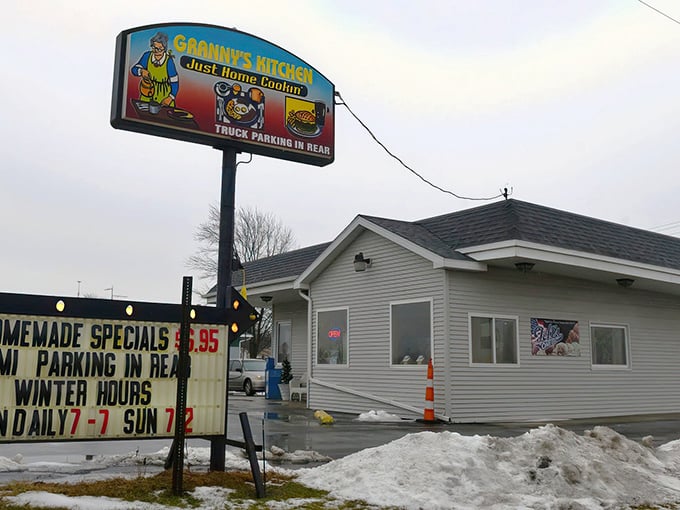 The unassuming exterior of Granny's Kitchen stands like a culinary secret waiting to be discovered. Simple gray siding, a few potted plants, and zero pretension.