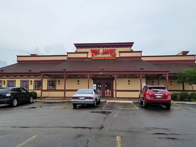 The unmistakable yellow and burgundy exterior of Tee Jaye's stands like a beacon for hungry travelers. This Newark institution promises comfort food that delivers on its every golden-hued promise.