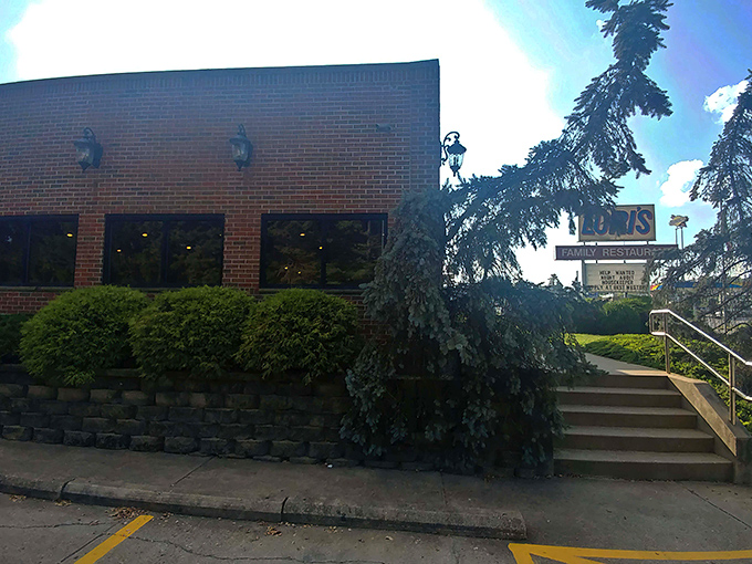 The brick fortress of flavor announces itself with a bold blue sign. Lori's stands ready to welcome hungry travelers into its comfort food kingdom.