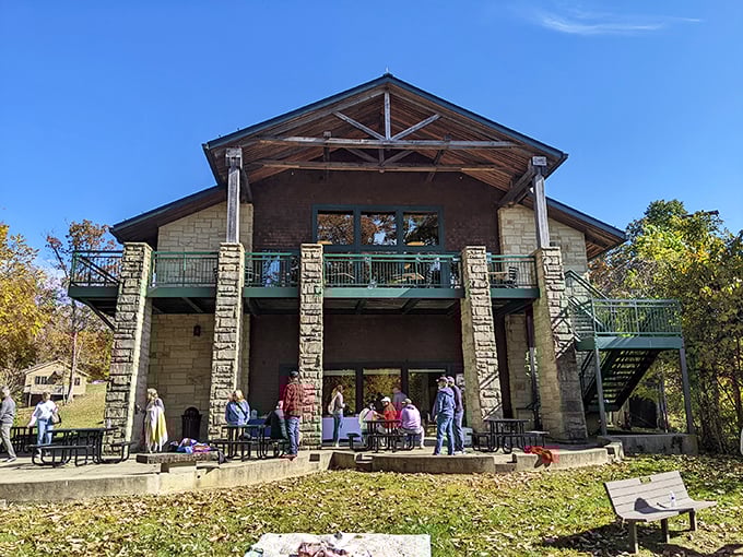 Stone pillars and timber beams create a mountain lodge masterpiece that seems to have grown organically from the Ohio hillside.