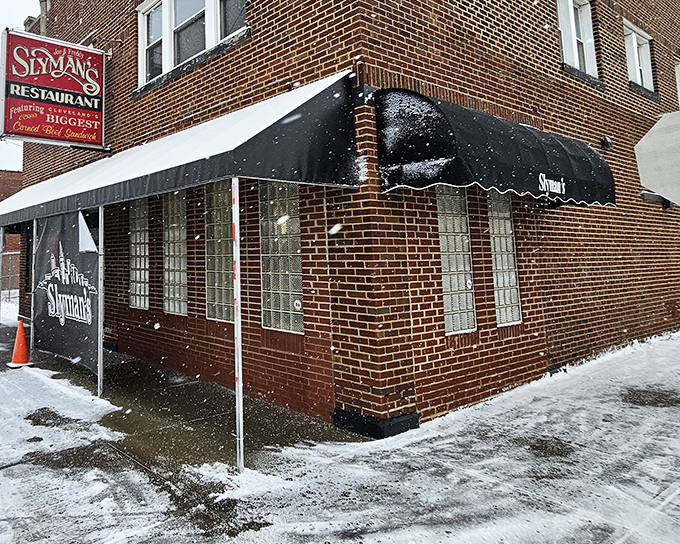 The corner brick building with its iconic black awning stands like a beacon of sandwich hope, even in Cleveland's winter snow.