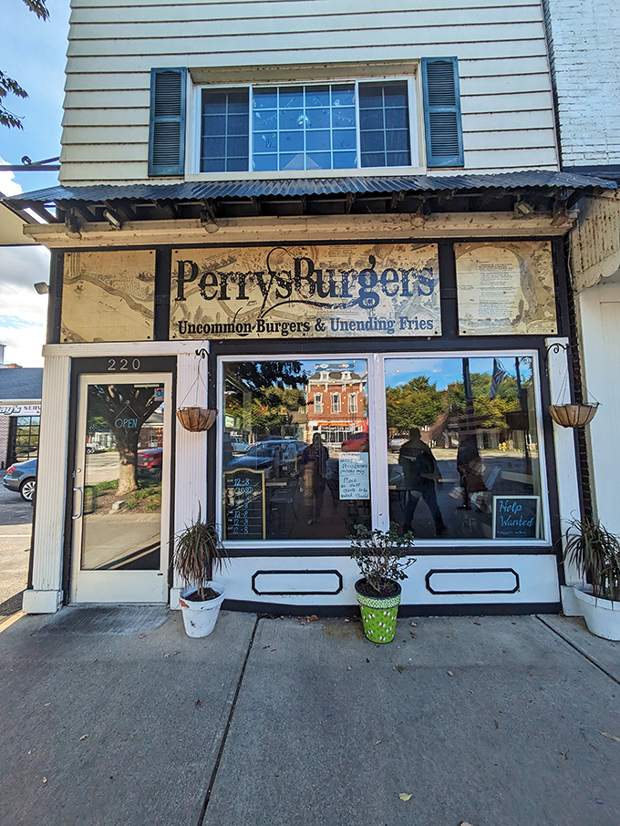 The unassuming storefront of PerrysBurgers promises "Uncommon Burgers & Unending Fries" &ndash; a bold claim that somehow still manages to undersell what awaits inside.