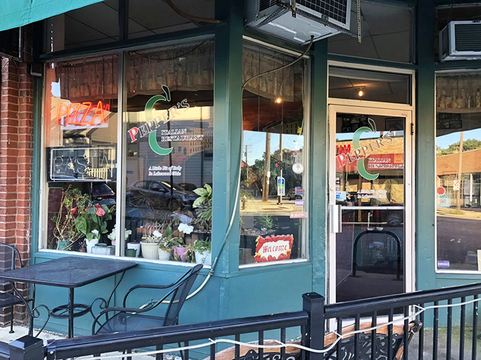 The warm glow from Peppers' corner location beckons like a lighthouse for the culinarily adrift, promising Italian comfort in brick-wrapped splendor.