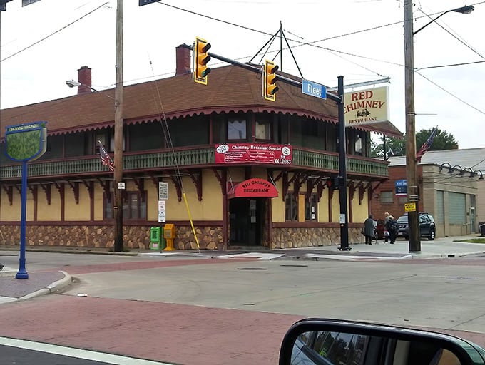 The iconic corner building with its distinctive red awning stands like a time capsule of comfort in Cleveland's Collinwood neighborhood.
