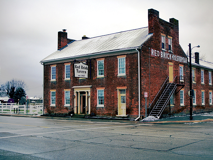 History stands proudly at the crossroads of America. This weathered red brick sentinel has welcomed weary travelers since stagecoaches rumbled down the National Road.
