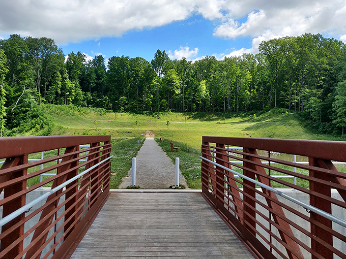 Nature's perfect mirror act &ndash; Mt. Gilead's lake reflects autumn foliage with such precision you'll wonder which side is the real show.