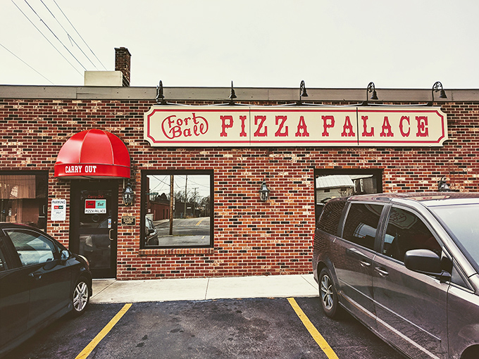 That classic brick facade hides culinary treasures that would make your Italian grandmother weep with joy.