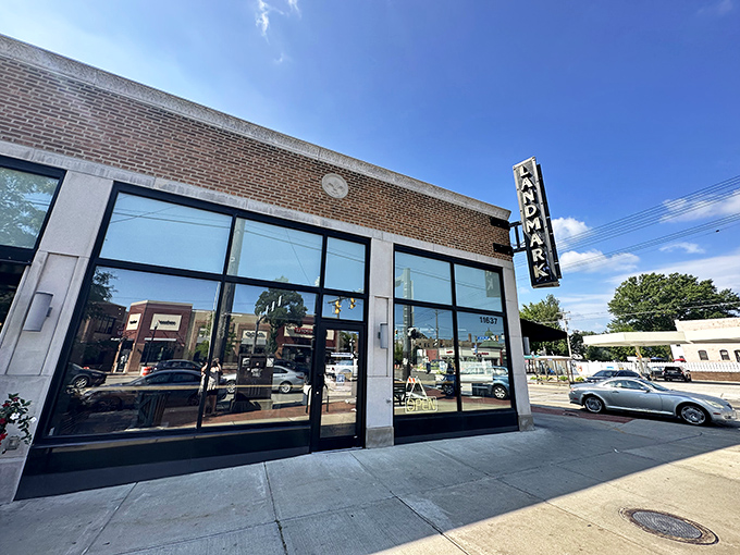 That vintage "LANDMARK" sign beckoning from the street corner promises serious barbecue business awaits inside.