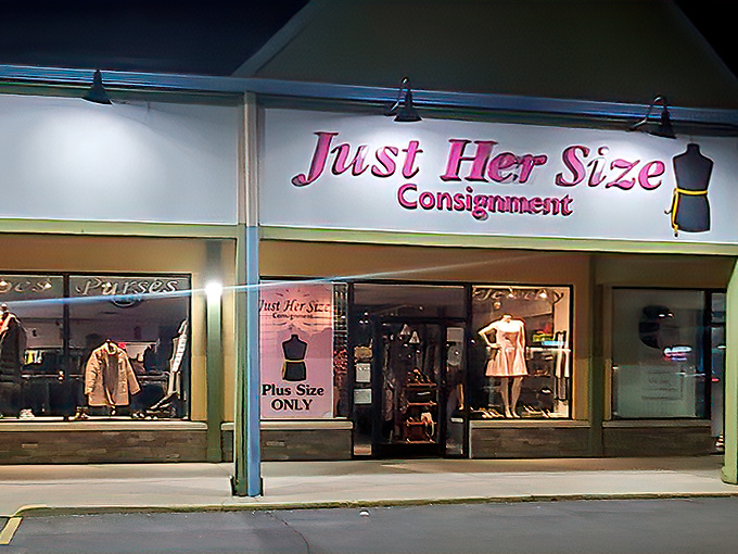 The pink neon sign of Just Her Size Consignment glows like a beacon for bargain hunters in Fairfield, promising fashion treasures waiting to be discovered.
