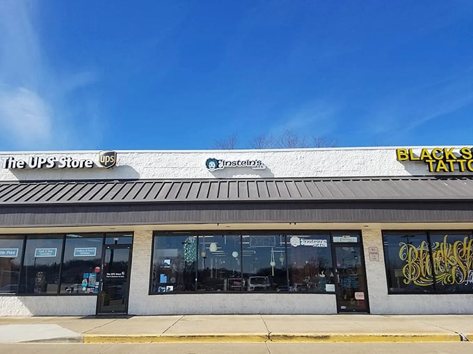 Einstein's Attic sits unassumingly between a UPS Store and tattoo parlor, proving that brilliance often hides in plain sight.