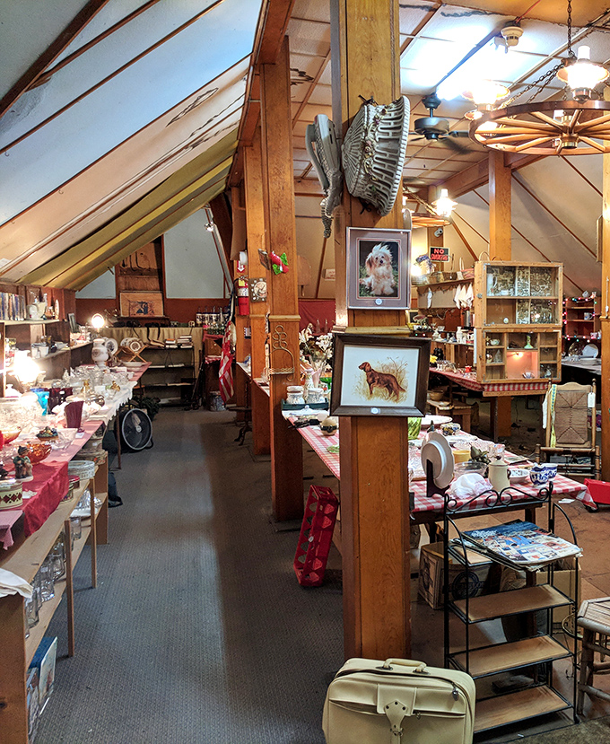 The attic of your dreams! Wooden beams frame this treasure-filled space where vintage collectibles await discovery around every corner.