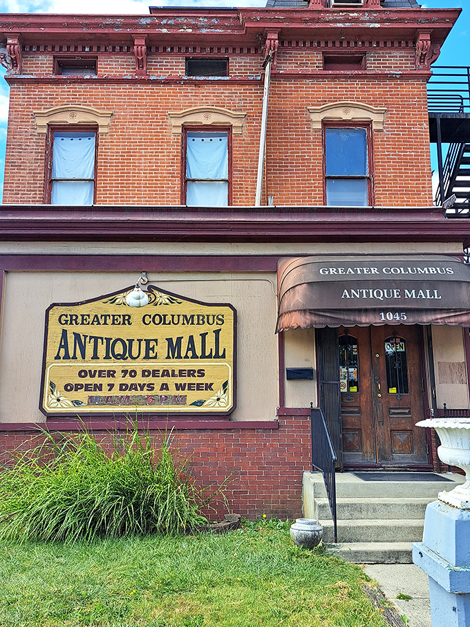 The historic red brick façade of Greater Columbus Antique Mall stands as a time capsule in Columbus' Brewery District, inviting treasure hunters with its vintage charm.