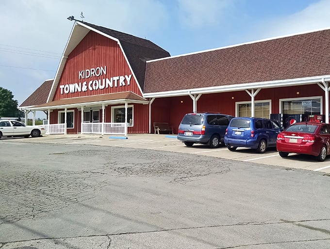 The iconic red barn exterior of Kidron Town & Country Market stands as a beacon of culinary promise in Ohio's Amish Country.