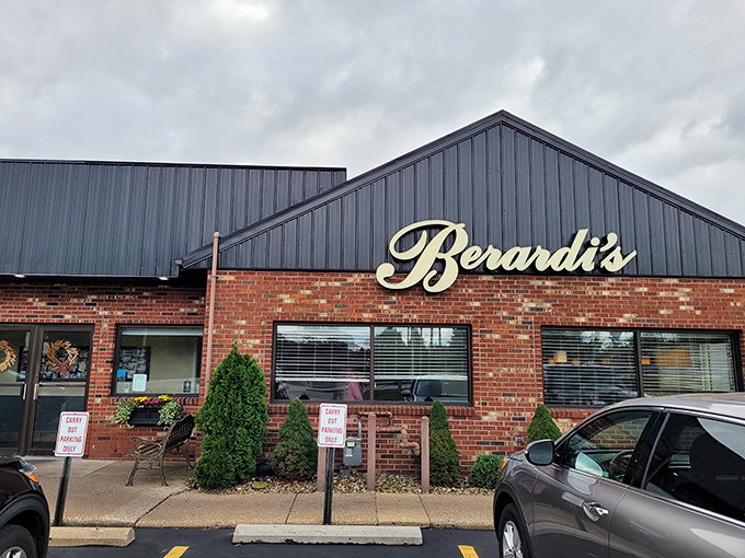 The brick-and-blue exterior of Berardi's stands like a culinary lighthouse on Ohio's north coast, beckoning hungry travelers with its simple promise of excellence.