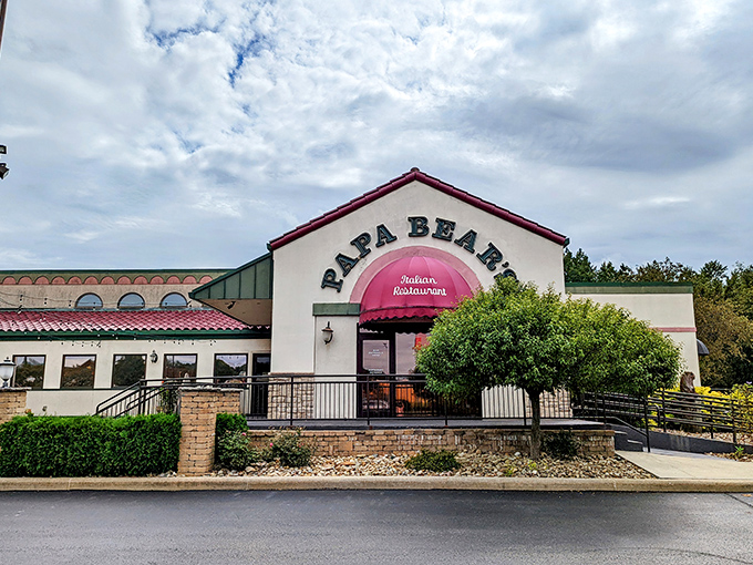The welcoming facade of Papa Bear's Italian Restaurant in North Canton beckons with its distinctive burgundy awning and stone accents&mdash;like a warm Italian hug in building form.