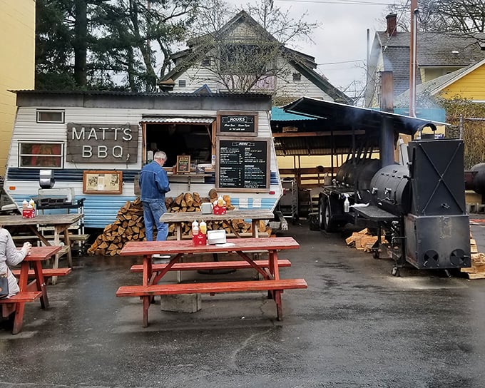 The humble blue trailer that launched a thousand BBQ pilgrimages. Matt's BBQ proves greatness doesn't require fancy digs&mdash;just wood, smoke, and patience.