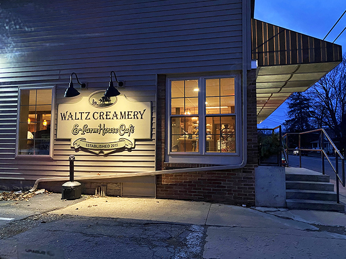 The twilight glow transforms this unassuming rural creamery into a beacon of culinary promise. Warm light spills from windows, inviting weary travelers to step inside and discover Pennsylvania's best-kept secret.