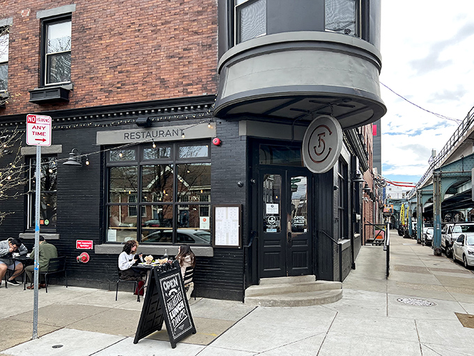 Architectural eye candy! Front Street Cafe's corner turret and brick facade create that perfect "where have you been all my life?" moment under Philadelphia's iconic El. 