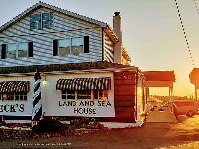 Beck's iconic lighthouse facade welcomes hungry travelers like a culinary beacon in the night, promising seafood treasures within.