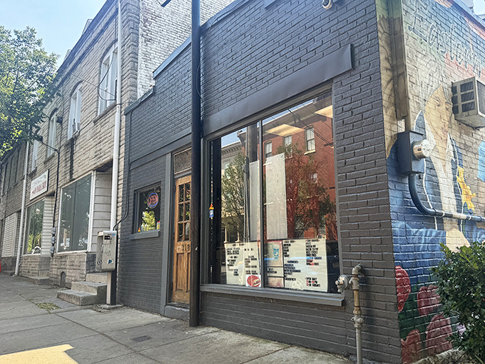 The unassuming gray brick exterior of Speed's hides culinary treasures within, like a sandwich speakeasy waiting to be discovered.