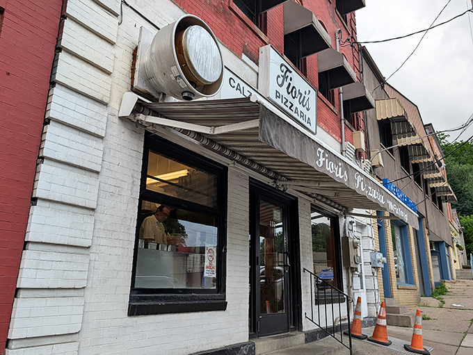 The unassuming brick facade of Fiori's Pizzaria stands like a culinary lighthouse on Brookline Boulevard, promising delicious salvation to hungry Pittsburghers.
