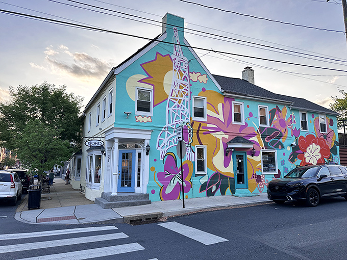 The charming pale yellow exterior with its distinctive blue door invites you into a world where French technique meets Pennsylvania hospitality.
