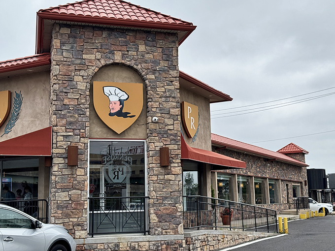 The stone facade of Penrose Diner stands like a culinary fortress, its "PR" shield logo promising protection from hunger pangs and disappointing breakfasts alike.