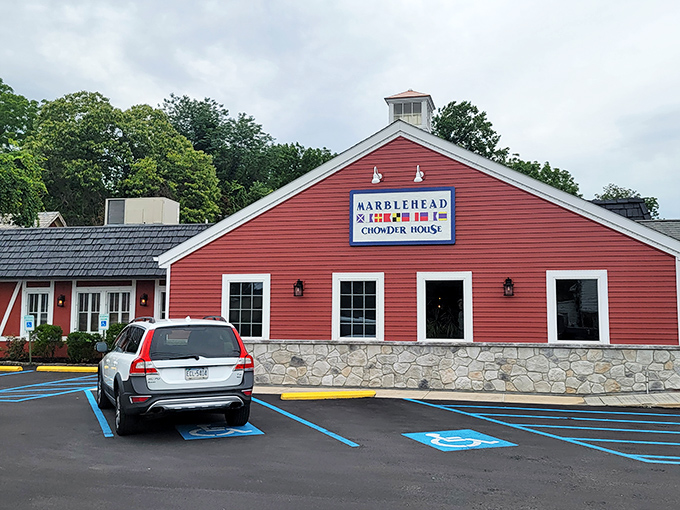 The iconic red barn exterior of Marblehead Chowder House stands like a New England lighthouse beacon in Pennsylvania, promising seafood salvation for the landlocked.