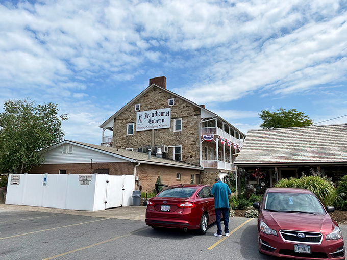 The Jean Bonnet Tavern stands proudly against the Pennsylvania sky, its sturdy stone walls having witnessed centuries of American history while patiently waiting for your dinner reservation.