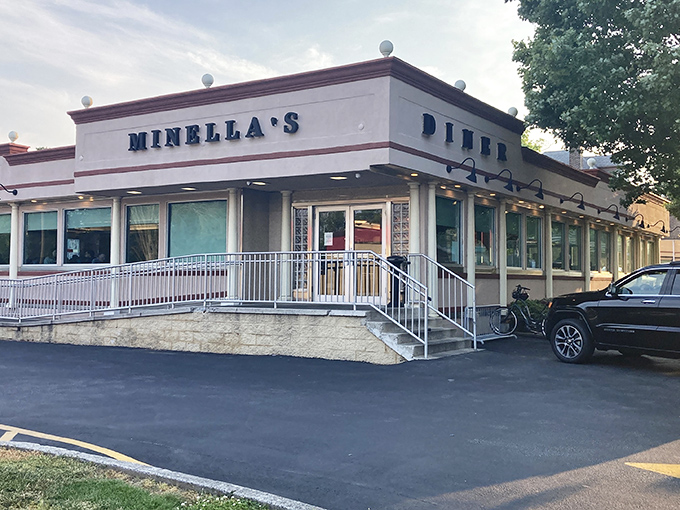 The classic cream-colored exterior of Minella's stands like a beacon of breakfast hope on Lancaster Avenue, promising comfort food salvation to hungry travelers.