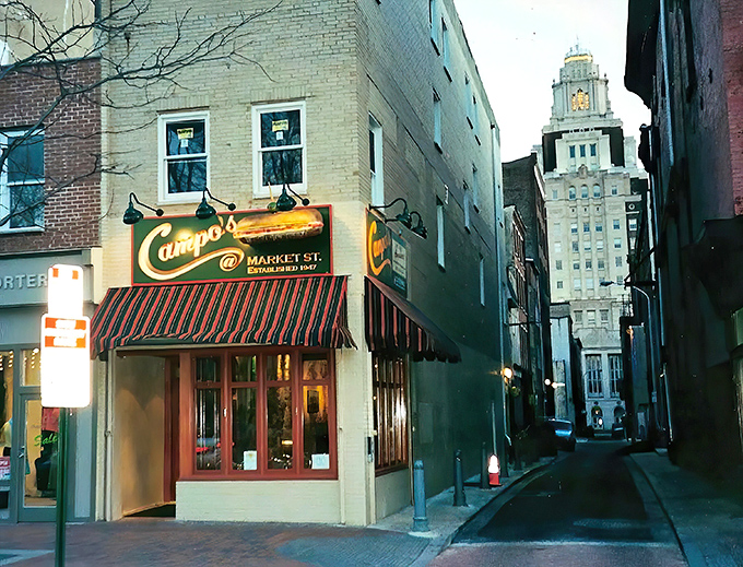 The iconic Campo's storefront beckons hungry travelers with its vintage signage and that glorious 3D cheesesteak jutting out like a meaty lighthouse in Old City Philadelphia.