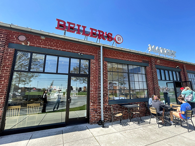 The brick facade of Beiler's welcomes donut pilgrims with its iconic red sign, promising sweet salvation within these hallowed walls.