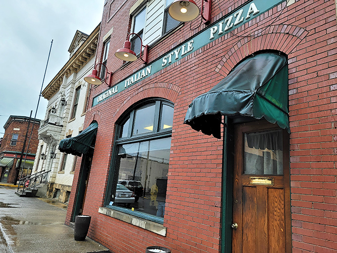 That classic red brick facade might fool you, but inside lies Pennsylvania's best-kept pepperoni secret.