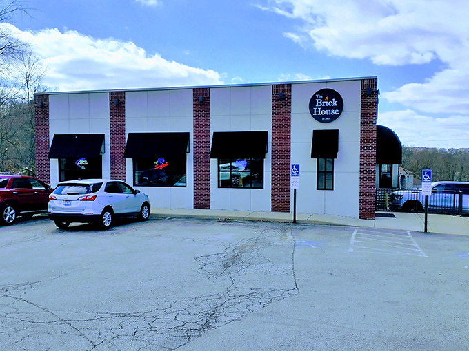 The unassuming exterior of Brick House Tap & Grill proves once again that culinary treasures often hide in plain sight.