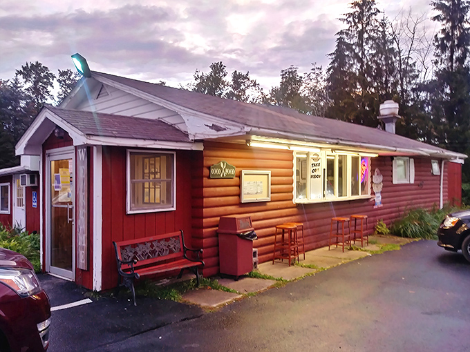The little red log cabin that could! This unassuming exterior in Spring Brook Township hides breakfast magic that locals have treasured for generations.