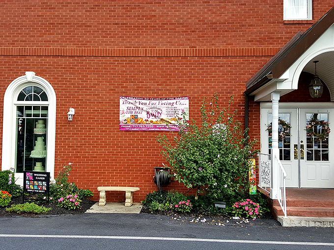 The brick fa&ccedil;ade of Pennsylvania Bakery welcomes sweet-toothed pilgrims with the promise of sugary salvation behind those white-trimmed doors.