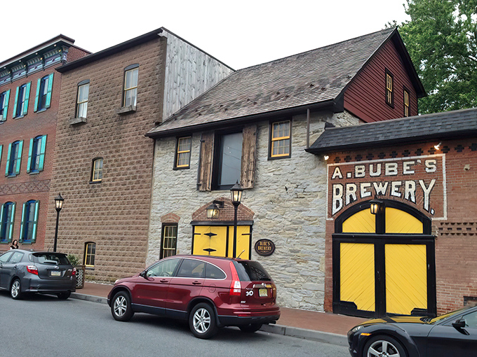 The historic fa&ccedil;ade of Bube's Brewery stands proudly in Mount Joy, its distinctive yellow and black accents beckoning curious food adventurers from miles around.