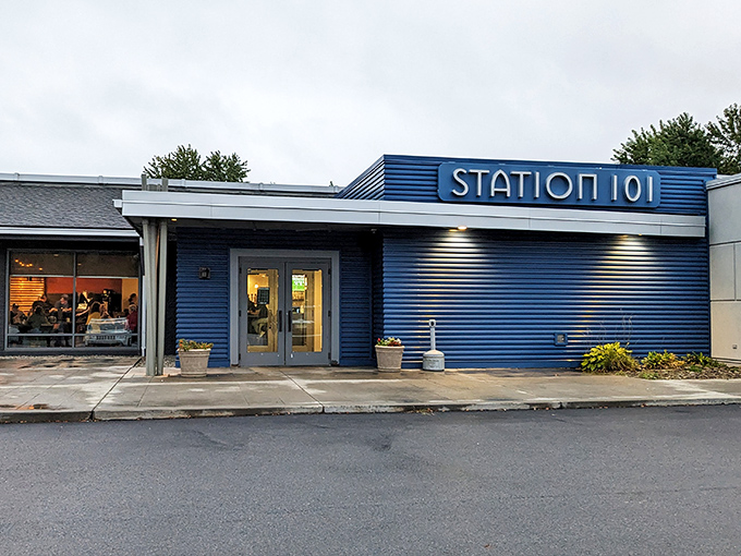 The blue exterior of Station 101 stands out like a sapphire in DuBois, promising culinary treasures that outshine its unassuming small-town setting.