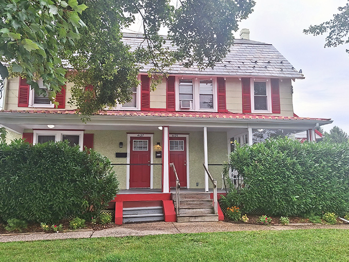 The charming red and white exterior of Cross Keys Diner stands like a beacon of breakfast hope in Doylestown, promising "GOOD EATS" that deliver on every syllable.