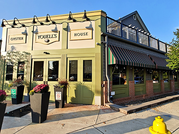 The sage green exterior of Youell's Oyster House beckons like a lighthouse for seafood lovers, promising oceanic treasures in the heart of Pennsylvania.