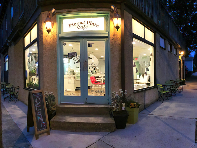 The corner storefront of Pie and Plate Cafe glows like a beacon of buttery hope in downtown Ambler, especially enchanting as dusk settles.