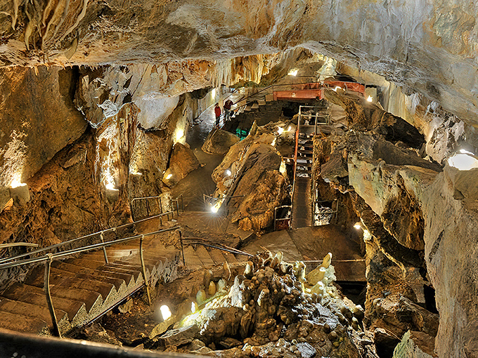Nature's cathedral reveals itself in all its limestone glory, complete with multi-level seating for the geological faithful.