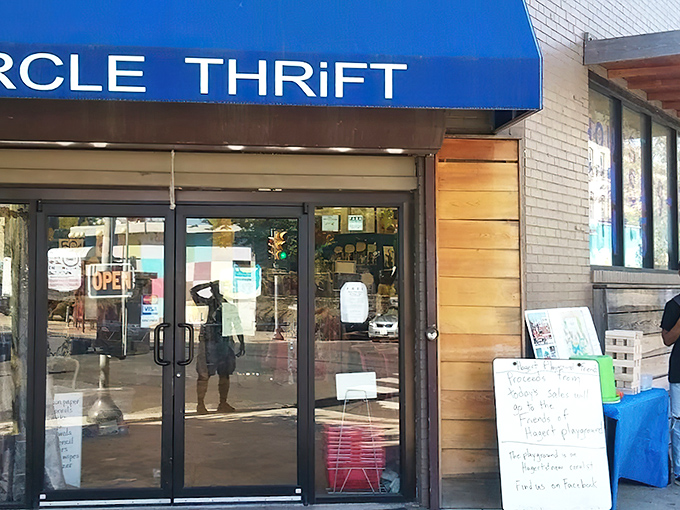 The blue awning beckons like a portal to bargain paradise. Circle Thrift's vibrant storefront stands out in Philadelphia's urban landscape, promising treasures within.